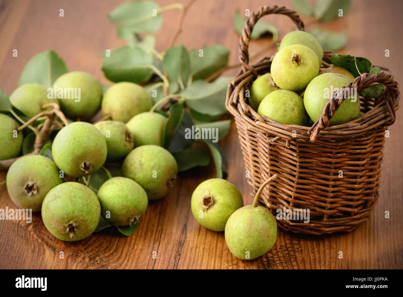 Basked of European wild pear Stock Photo - Alamy
