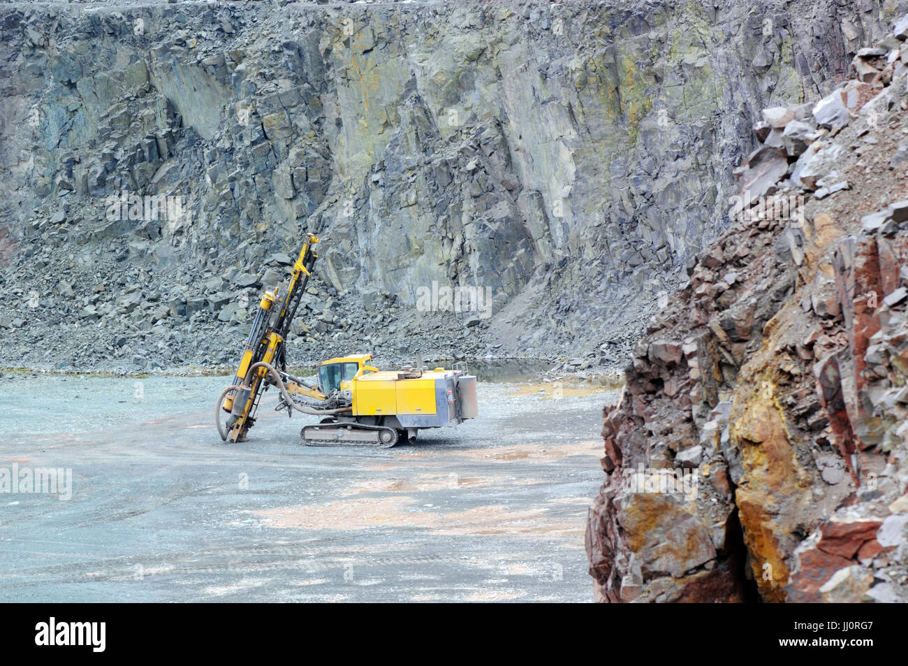 Driller in a quarry mine. mining industry Stock Photo - Alamy