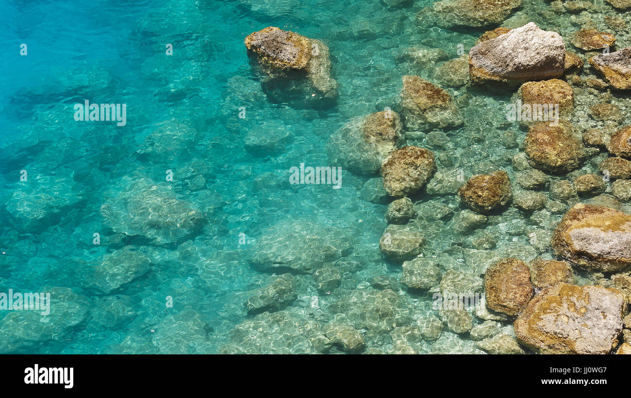 Transparent clean sea water off the coast, a gradient of blue from the ...