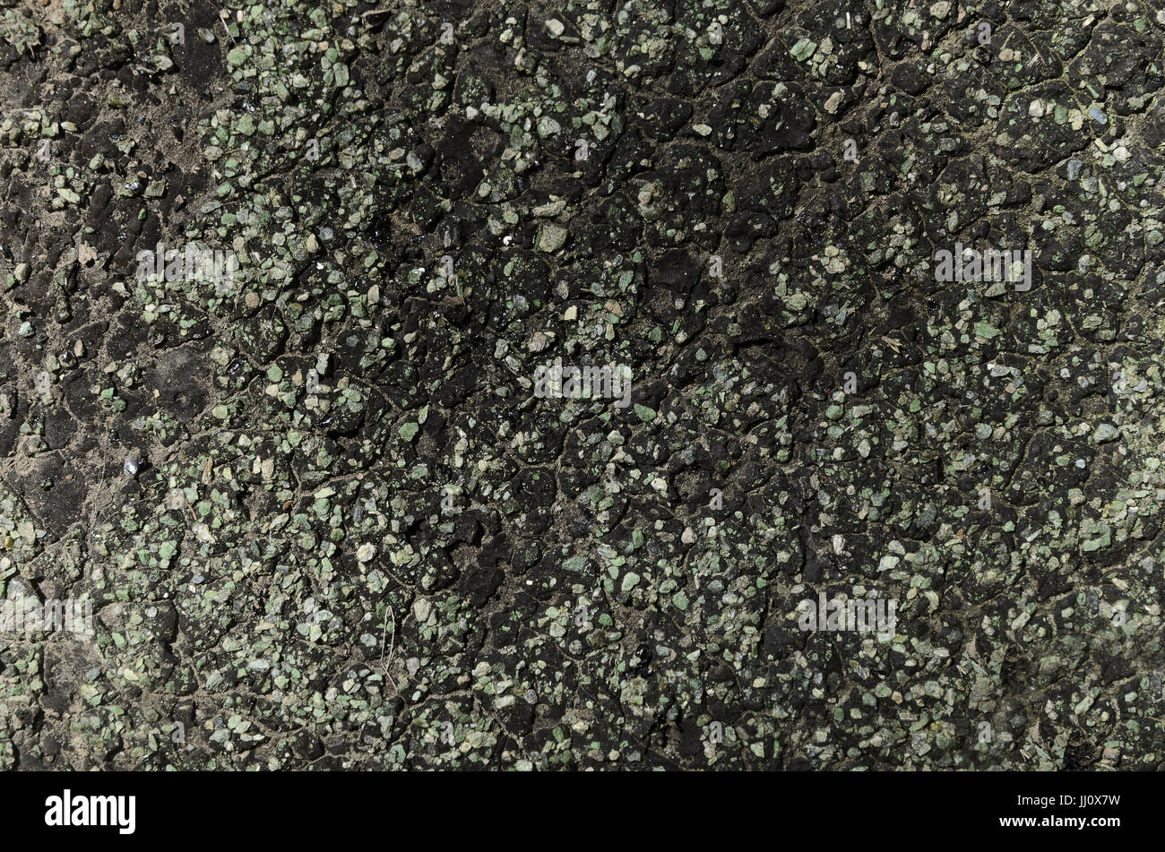 Gravel on black resin Stock Photo - Alamy
