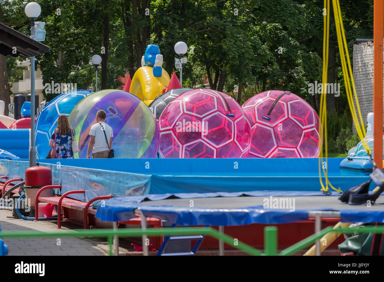 Entertaining attractions on a pedestrian street in the center of the ...