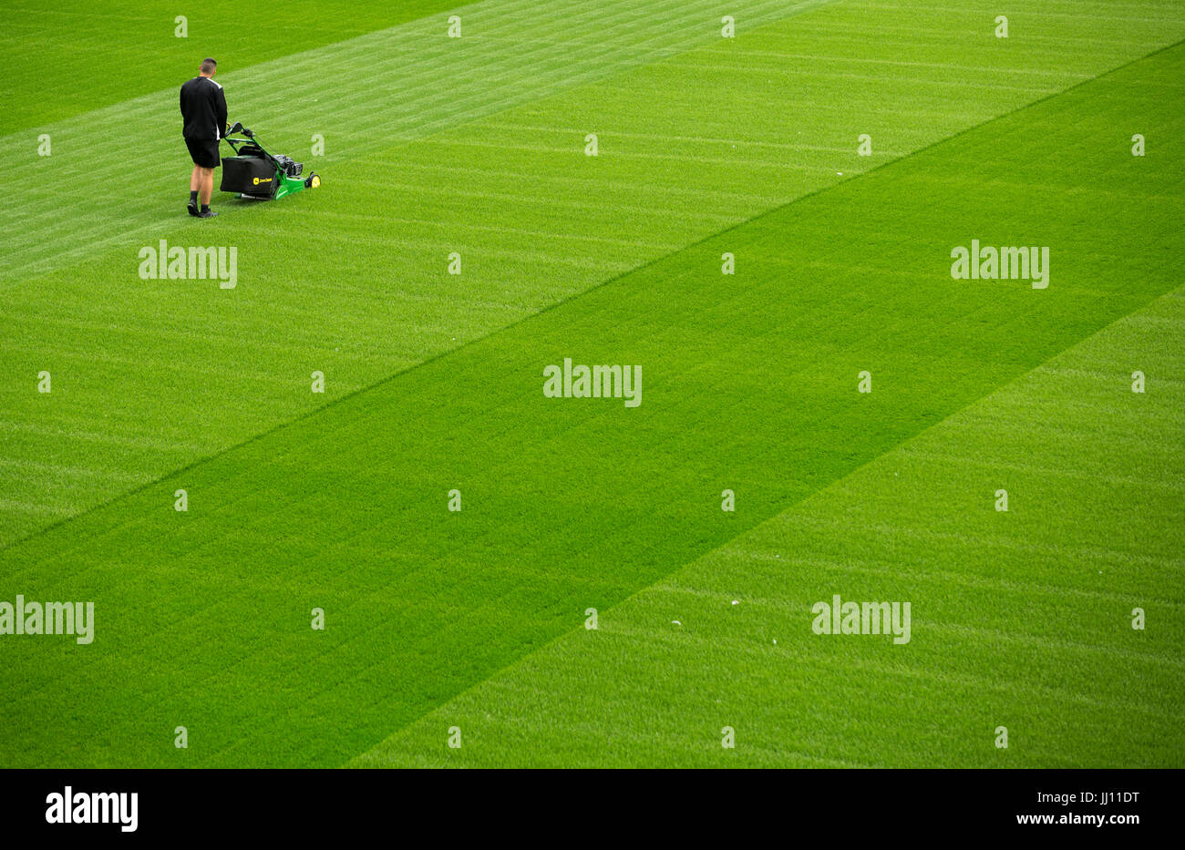 Football pitch grass cutting hi-res stock photography and images - Alamy
