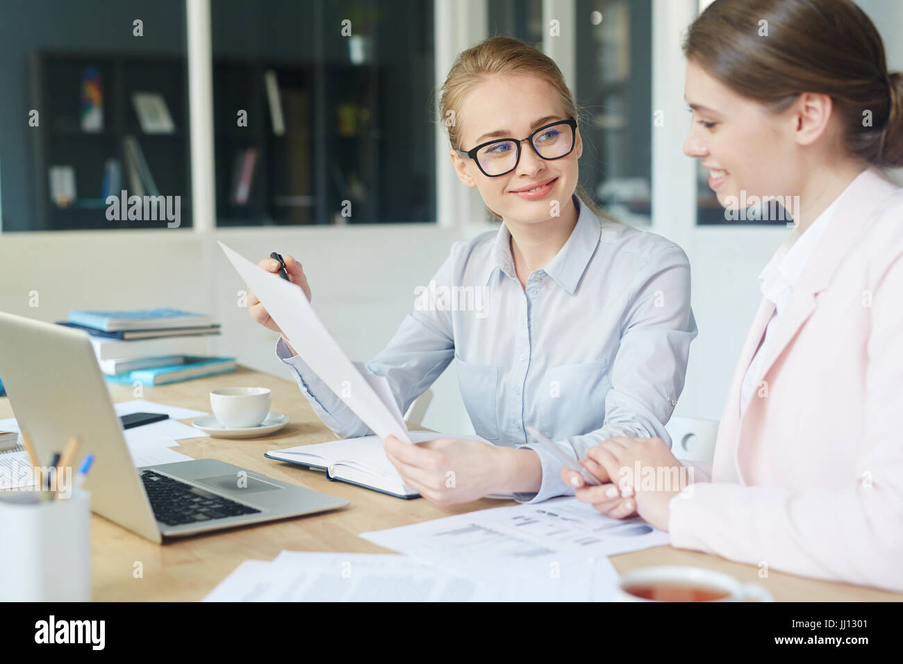 Pointing at contract Stock Photo - Alamy