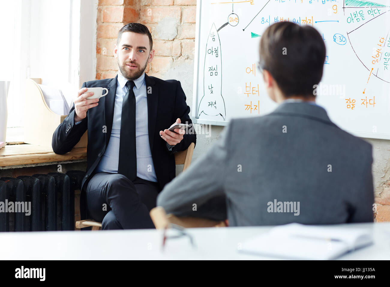 Tea-break in office Stock Photo - Alamy