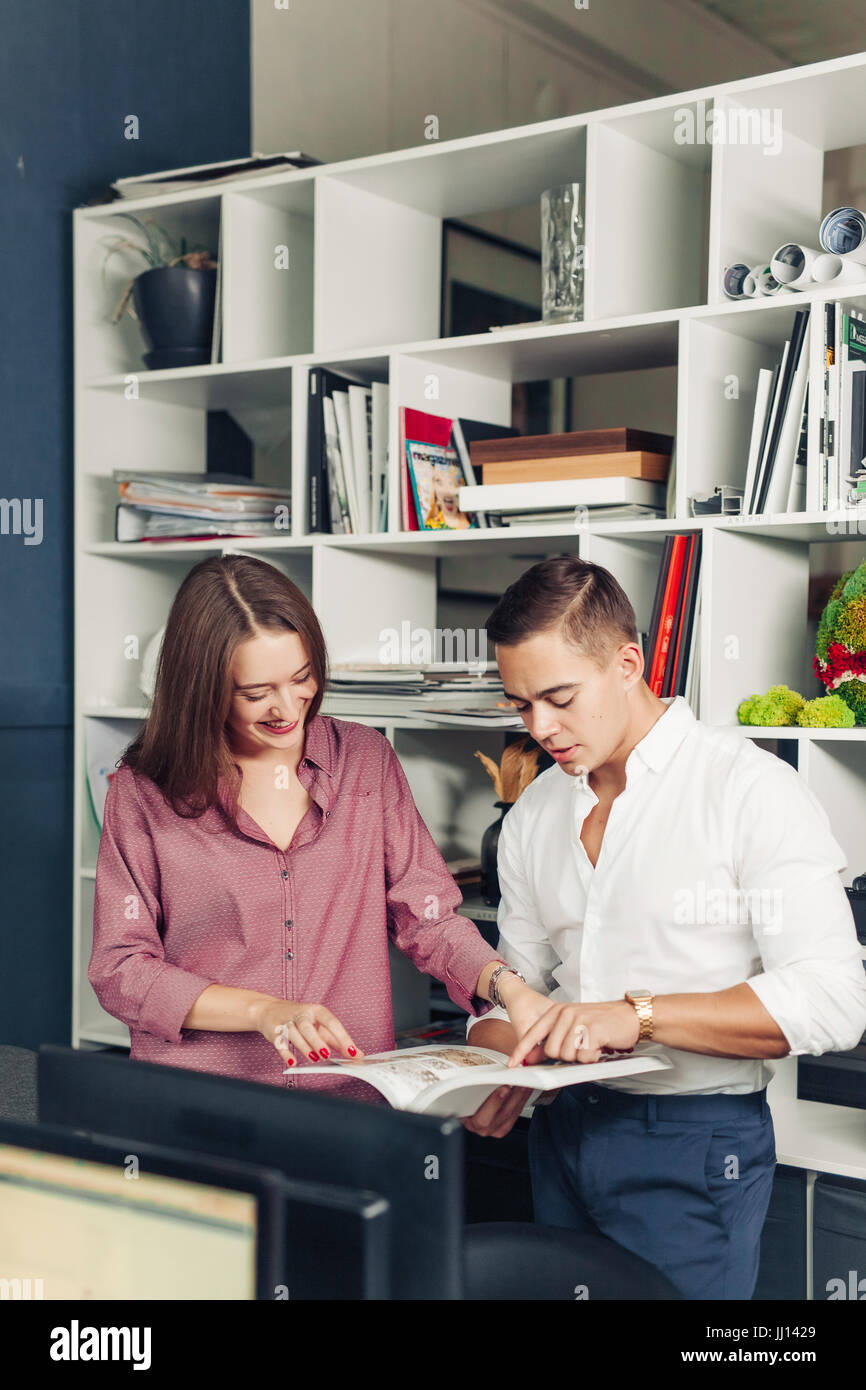 Students reading together in library hi-res stock photography and ...