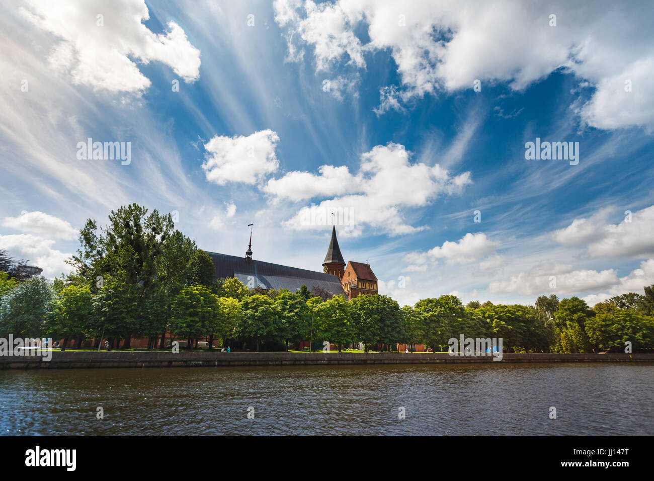 Beautiful cloudy landscape over the Cathedral of Kaliningrad in summer ...