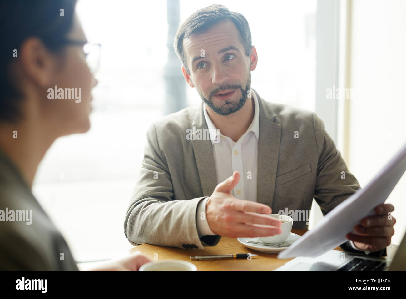 Businessman discussing contract client hi-res stock photography and ...