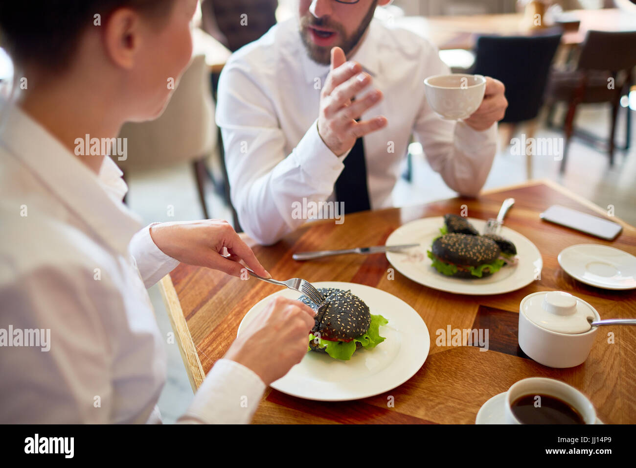 Lunch of business partners Stock Photo - Alamy