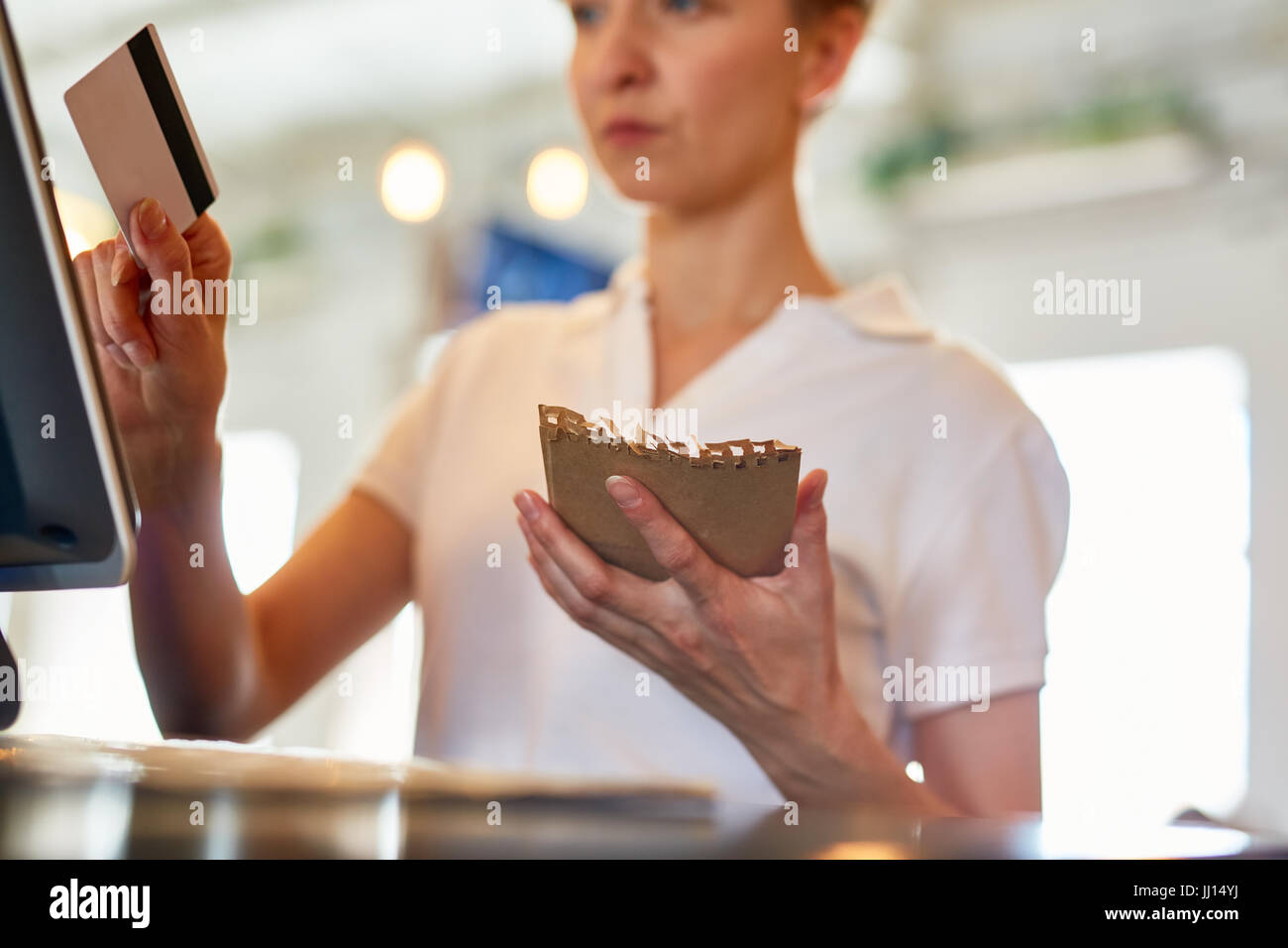 Payment by card Stock Photo - Alamy