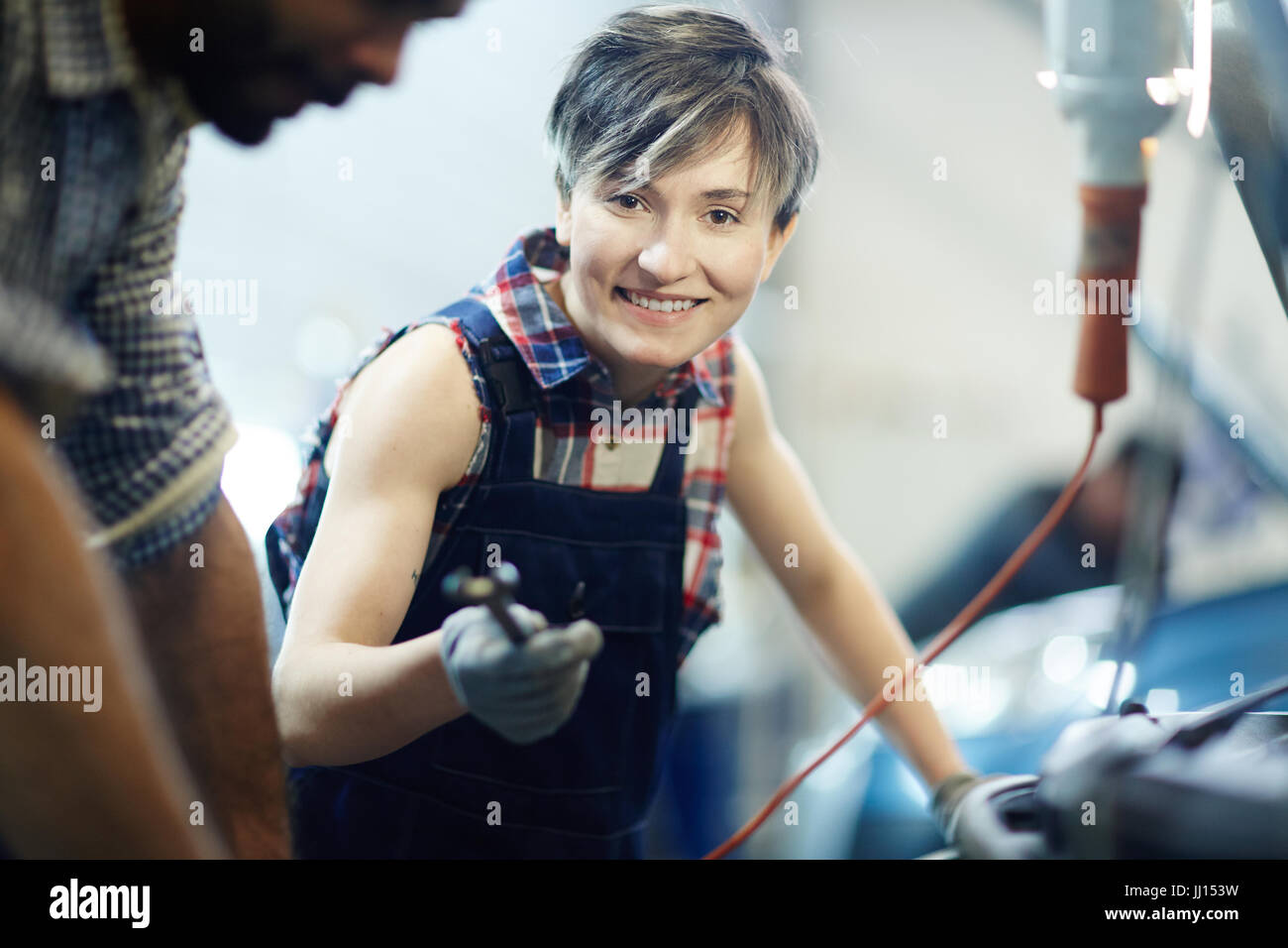 Work in garage Stock Photo - Alamy