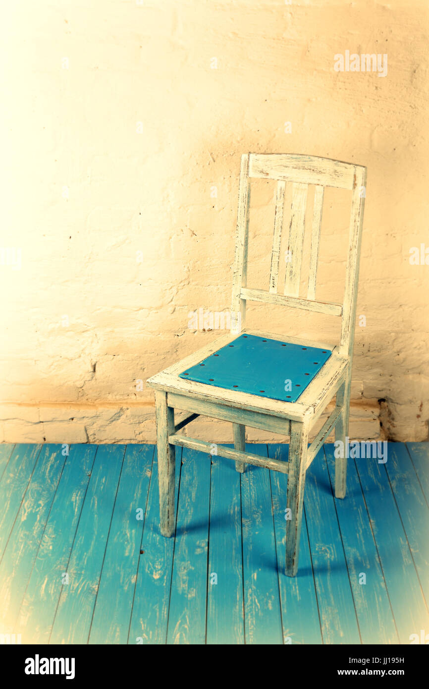 Retro style - vintage old chair on a wooden and Brickwork background ...