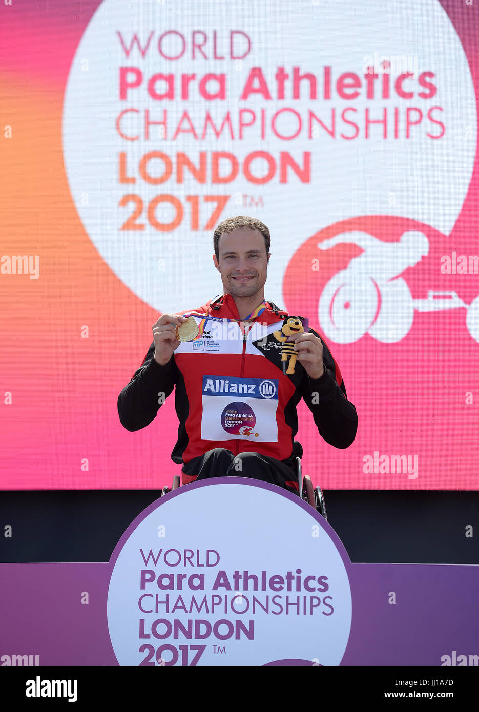 Switzerland's Marcel Hug with his gold medal after the Men's 1500m T54 ...