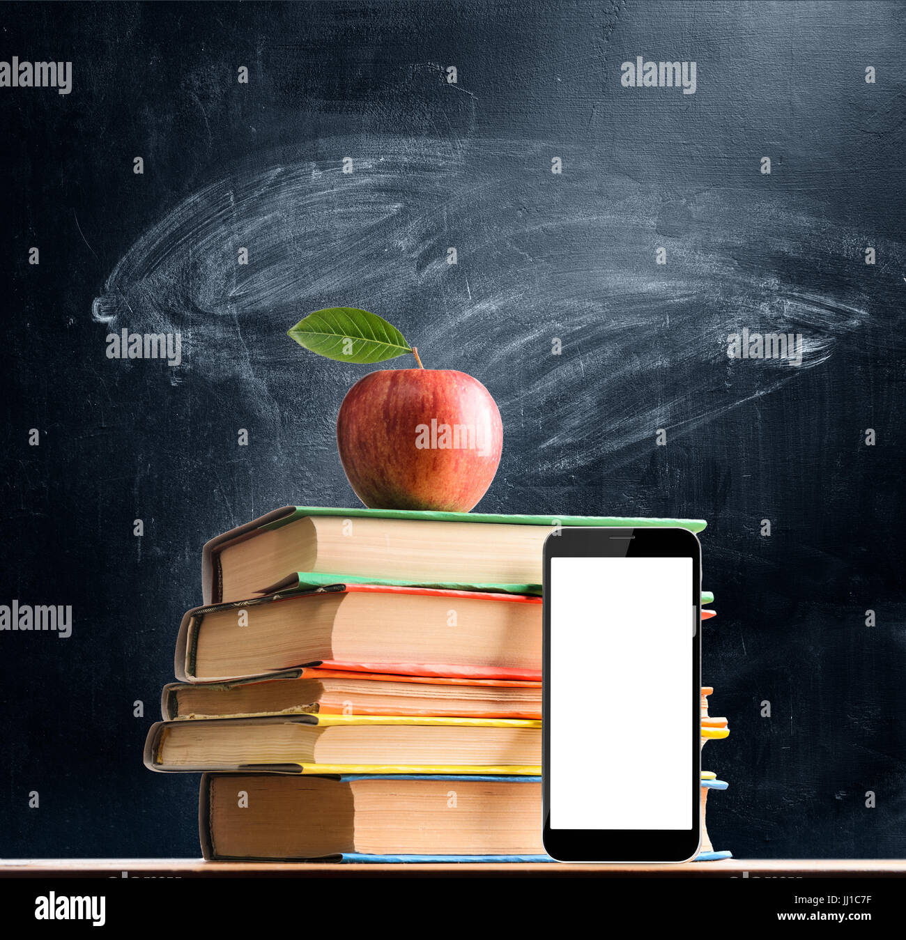 School books and smartphone Stock Photo - Alamy
