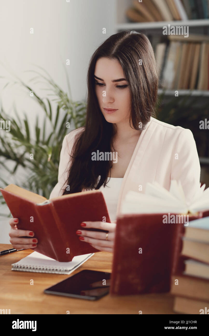 Education and study. Woman in the library Stock Photo - Alamy