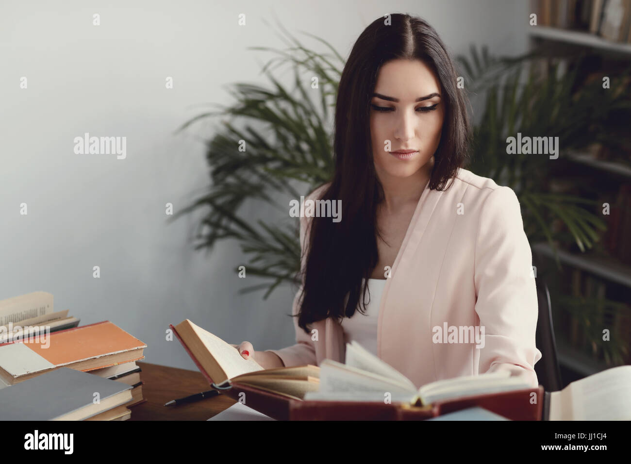 Education and study. Woman in the library Stock Photo - Alamy