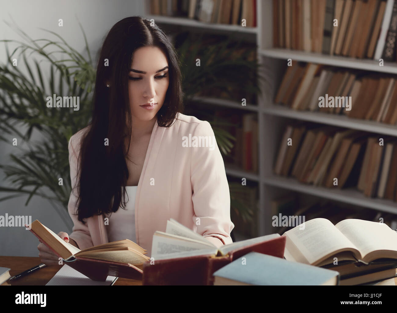 Education and study. Woman in the library Stock Photo - Alamy