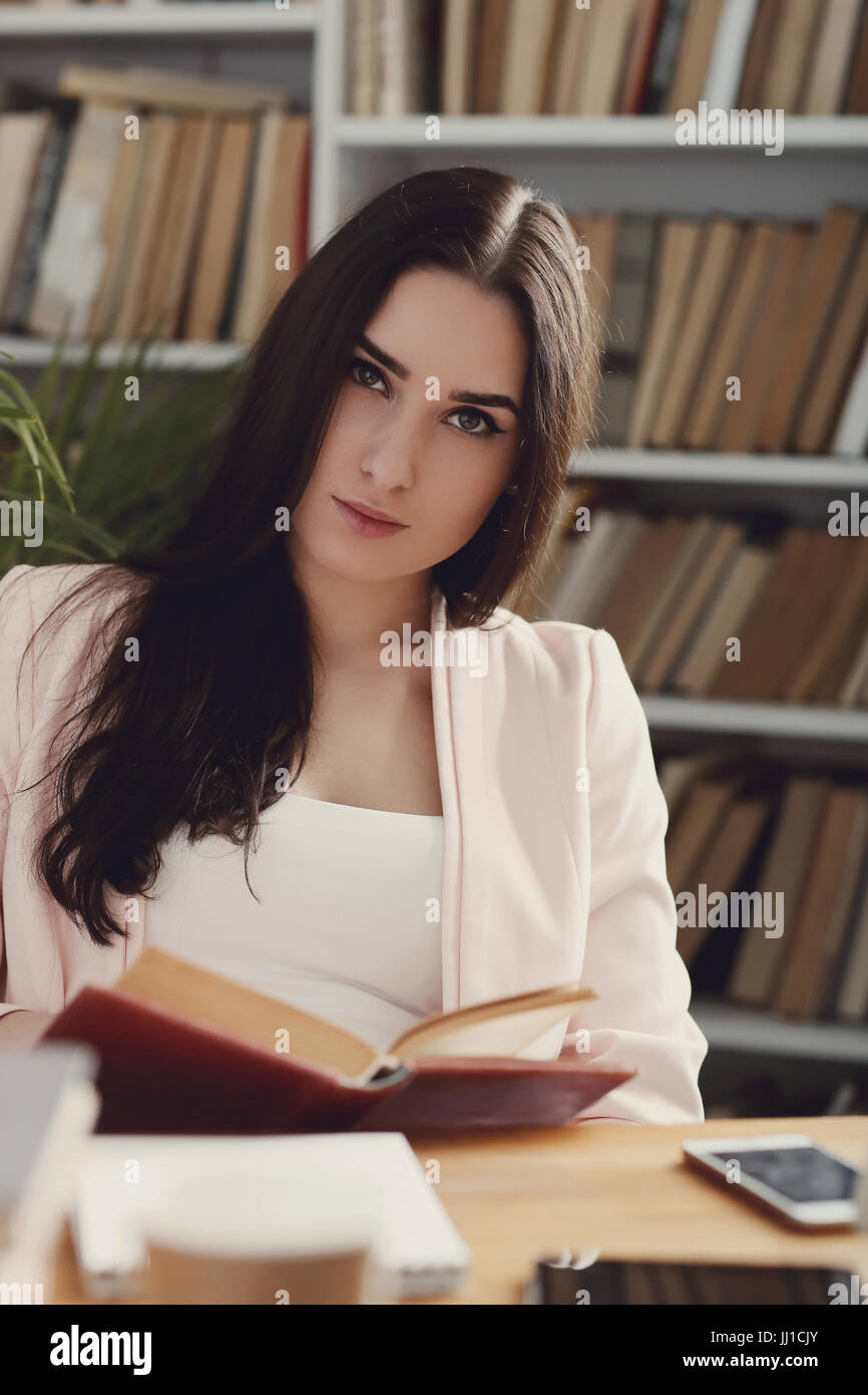 Education and study. Woman in the library Stock Photo - Alamy