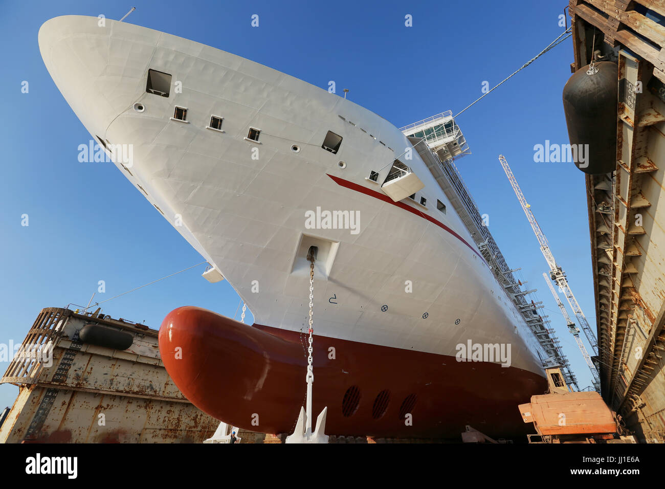 cruise ship in a floating drydock Stock Photo - Alamy