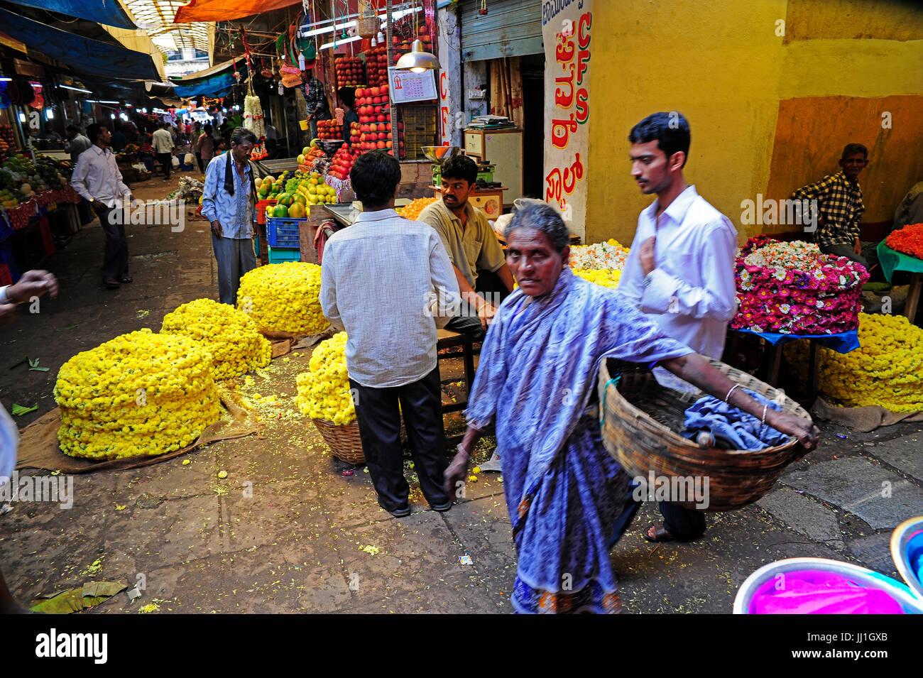 Indian people at the busy Devaraja Flower Market at Mysore, Karnataka ...