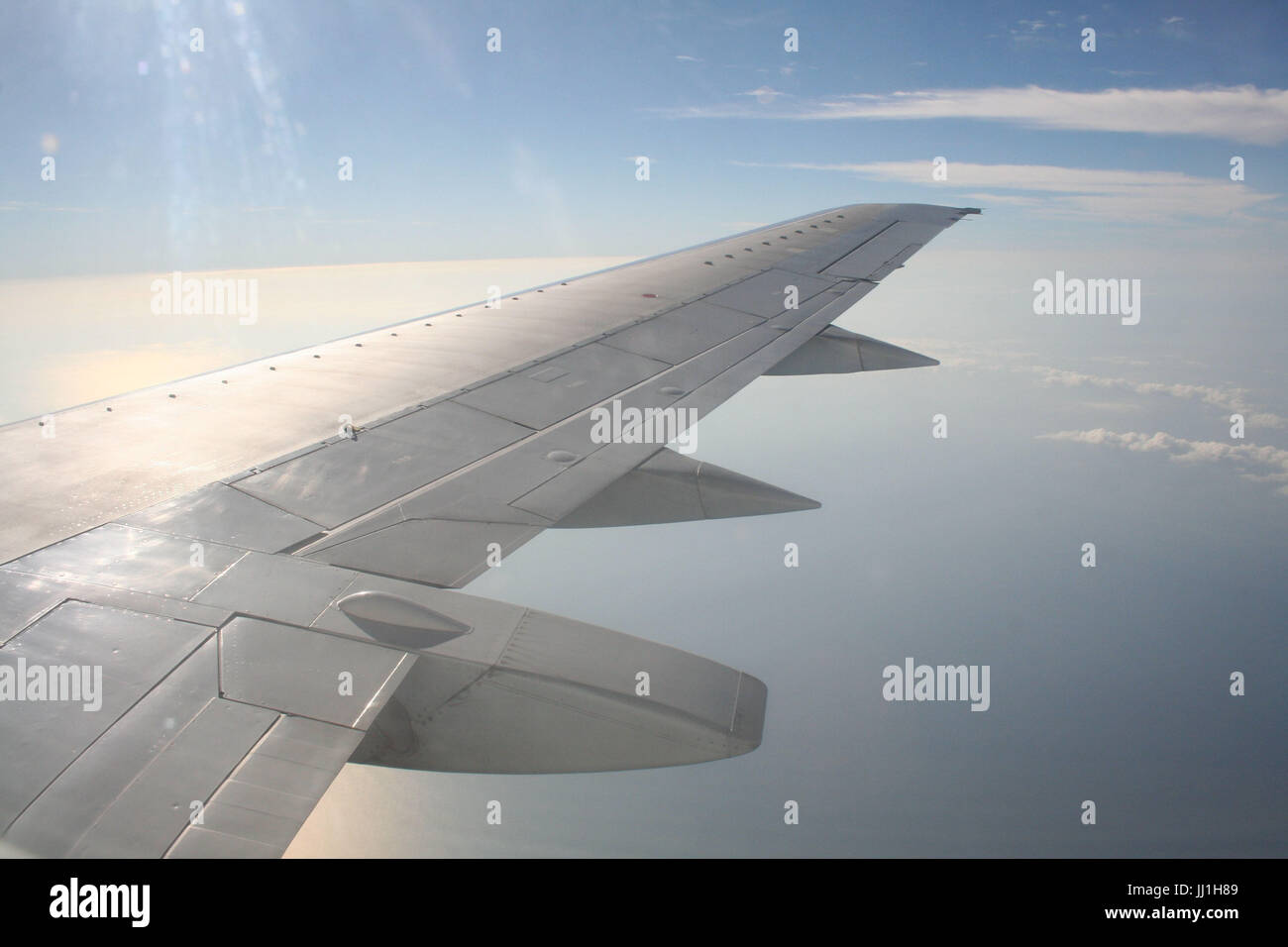 Airplane wings in clouds, Brazil Stock Photo - Alamy