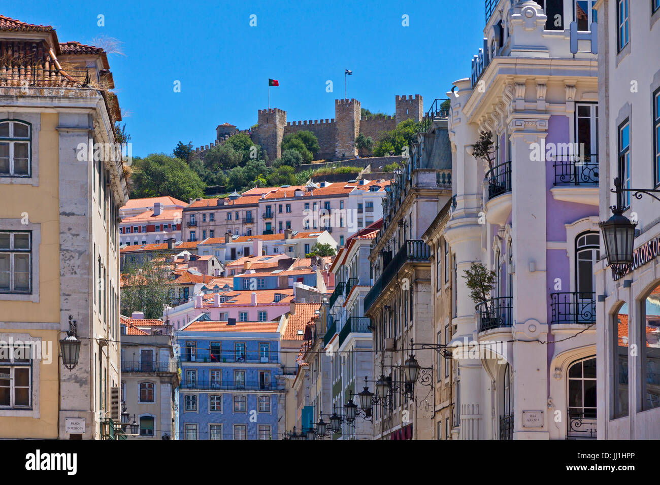 The visible profile of the Castle of Sao Jorge (Castelo de Sao Jorge) overlooking the historical ...