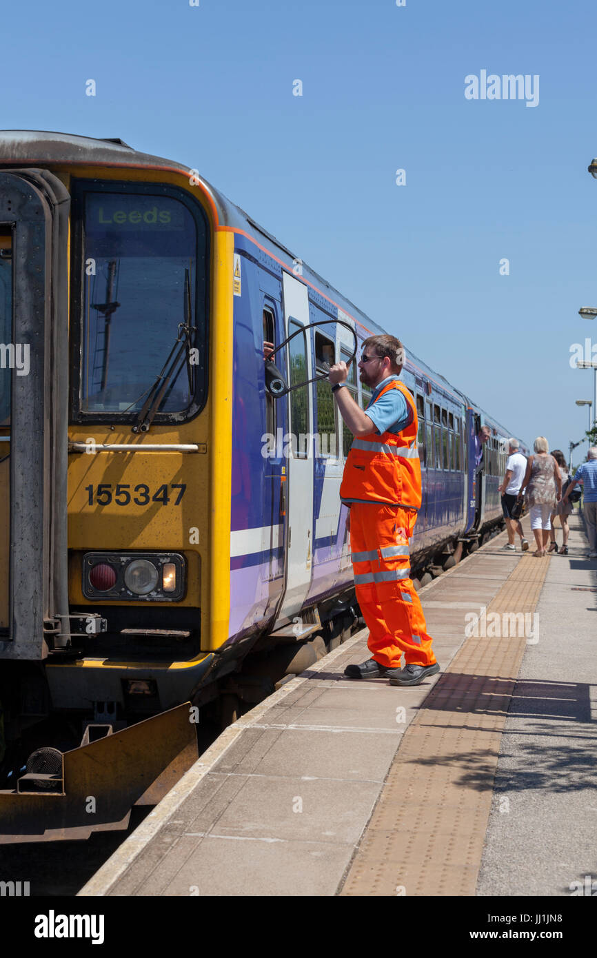 The signal man at Hammerton, on the York to Harrogate line collecting ...