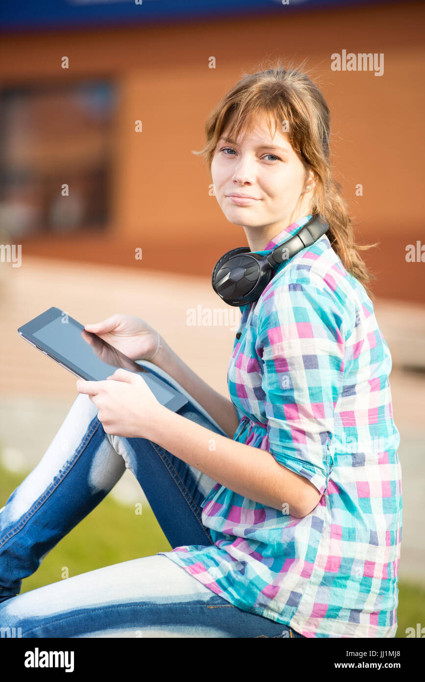 Beautiful young woman student with note pad. Outdoor student Stock ...