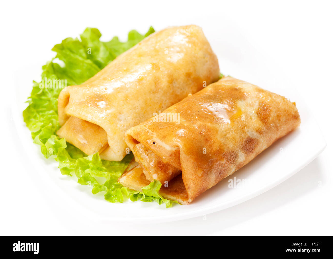Rolled pancakes - russian blini Stock Photo - Alamy