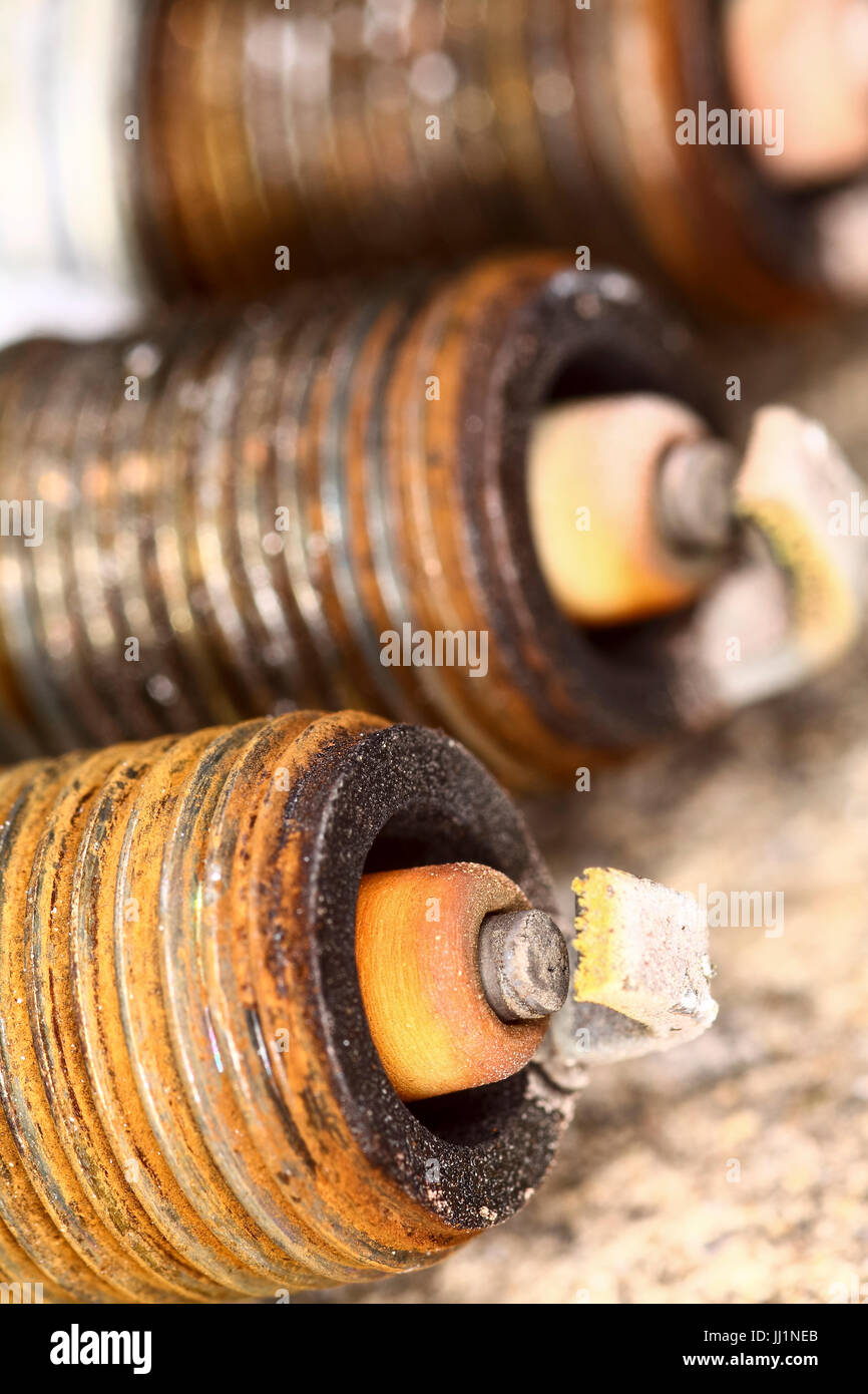 Used spark plug from a car engine Stock Photo - Alamy