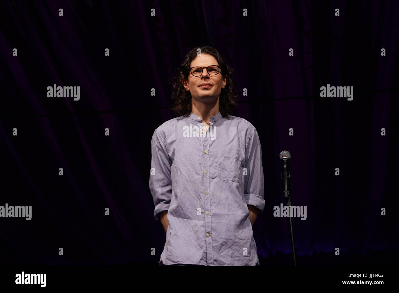 Simon Amstell performing live on the Comedy stage on Day 4 (Sunday) of ...