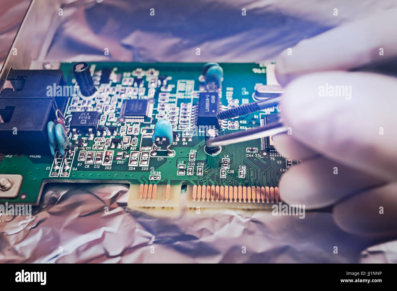 Electronic technician repairing computer hardware in the lab. Close up ...