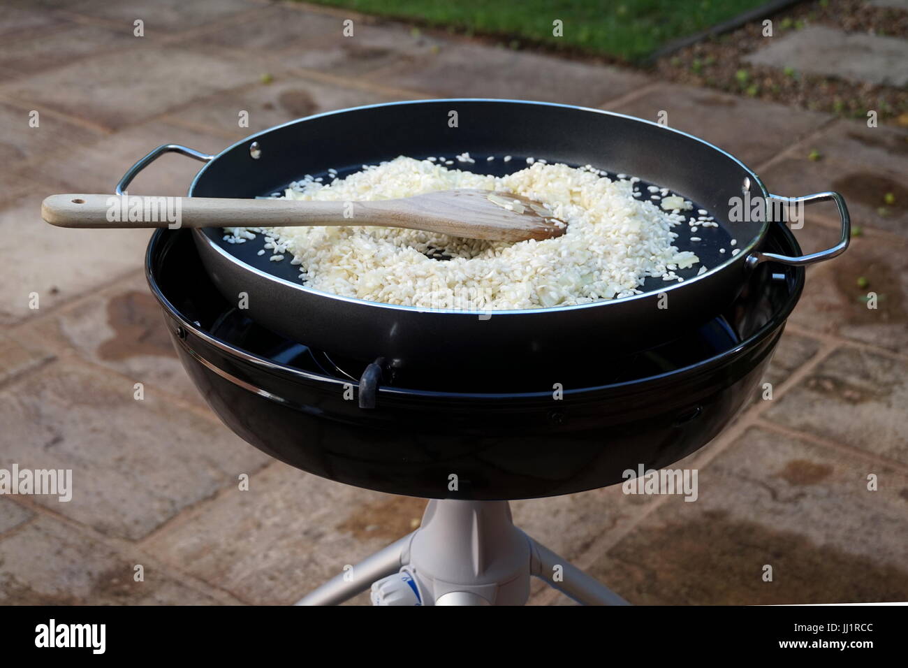 Paella pan cooking outside local hi-res stock photography and images ...