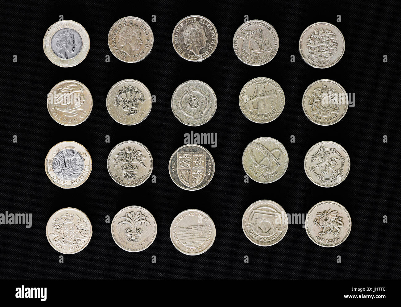Rear face of a variety of UK one pound coins Stock Photo - Alamy