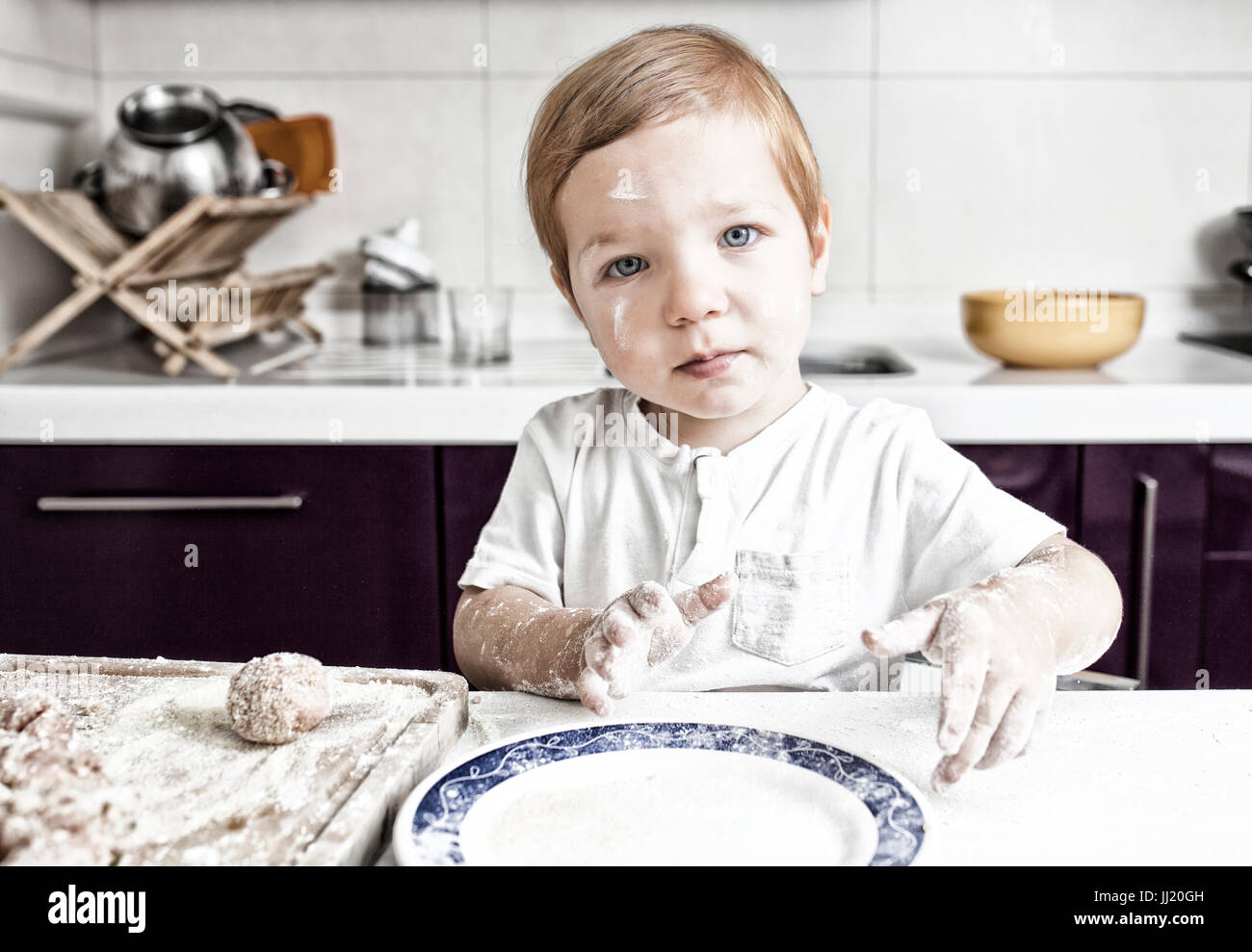 Baby kitchen funny hi-res stock photography and images - Alamy