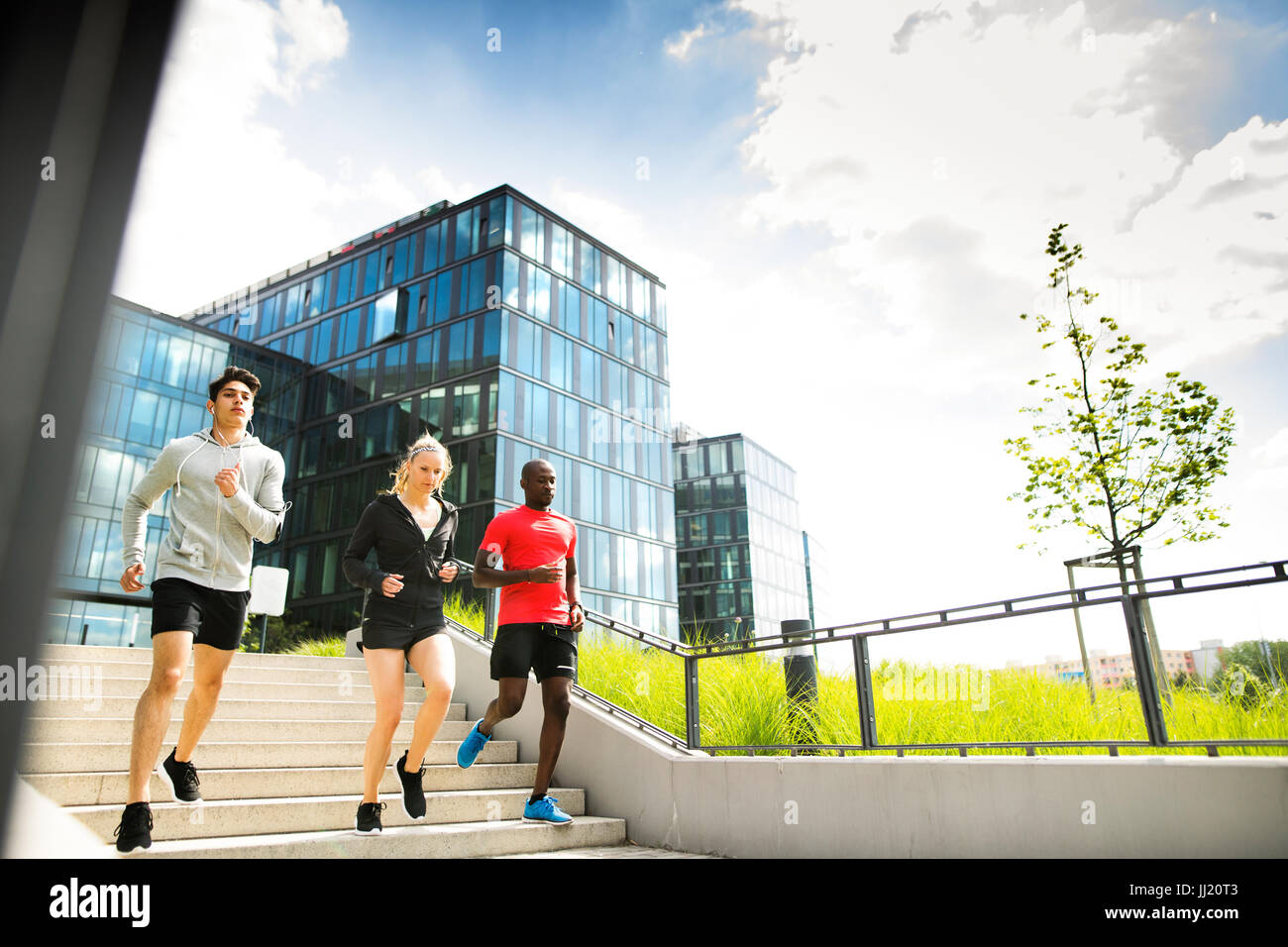 Young man running stairs in hi-res stock photography and images - Alamy