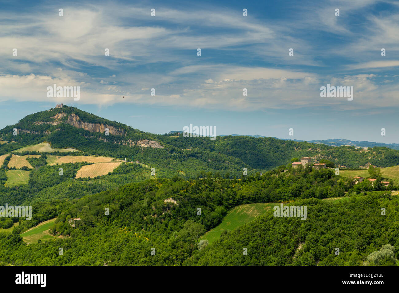 Tuscan landscape with hills, forest and farm Stock Photo - Alamy