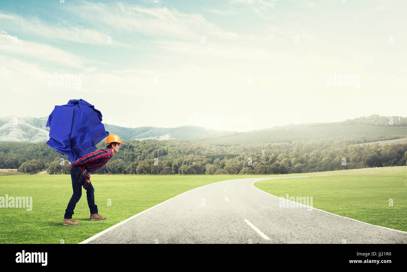 Engineer man carry load Stock Photo - Alamy