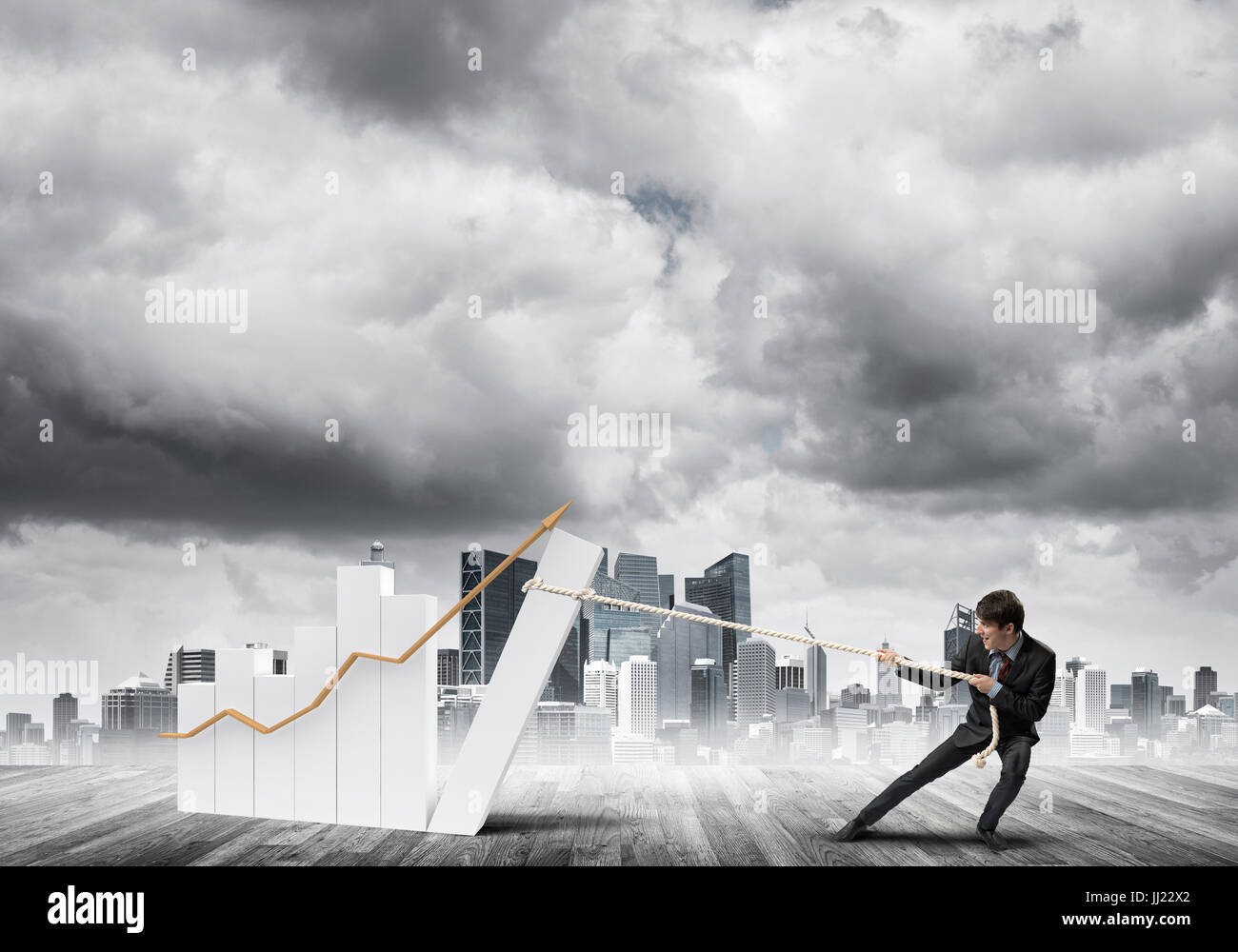 Man pulling with effort big pulling rope graph, as a symbol of ...