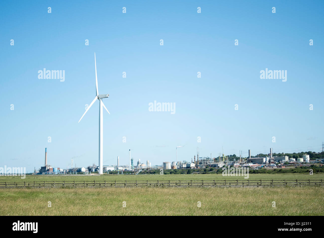 Pylons and wind turbines generating and distributing electricity to the ...