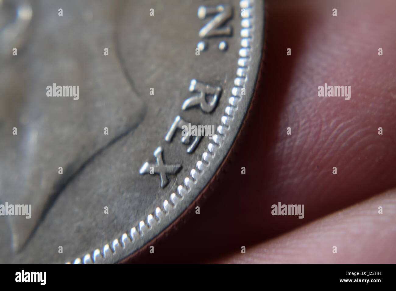 Edge of a silver coin Stock Photo - Alamy