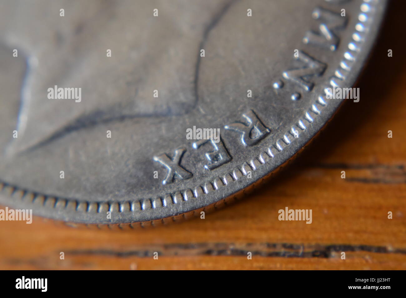 Edge of a silver coin Stock Photo - Alamy