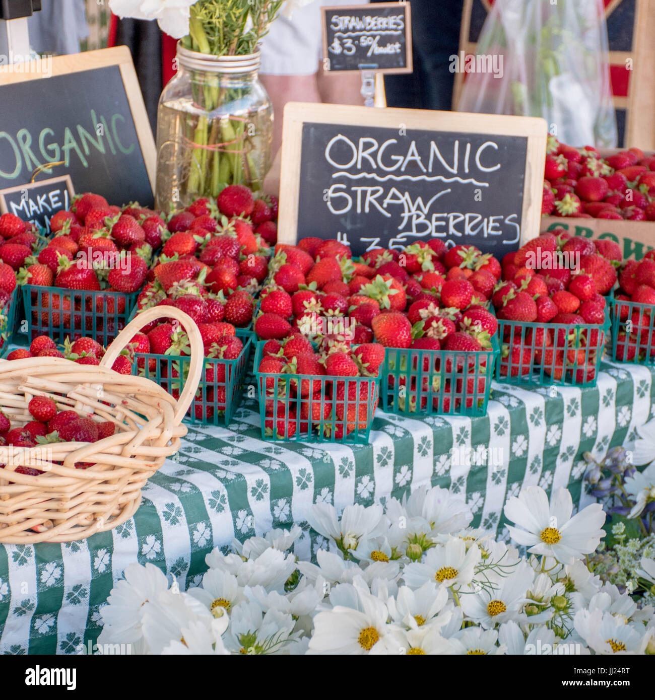 Locally grown strawberries baskets hi-res stock photography and images ...