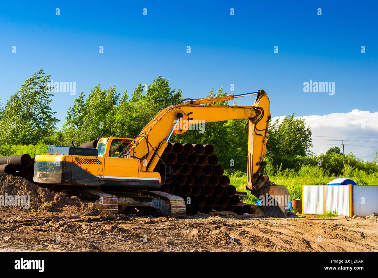 Crawler Excavator digging bucket on construction of high-speed ring ...