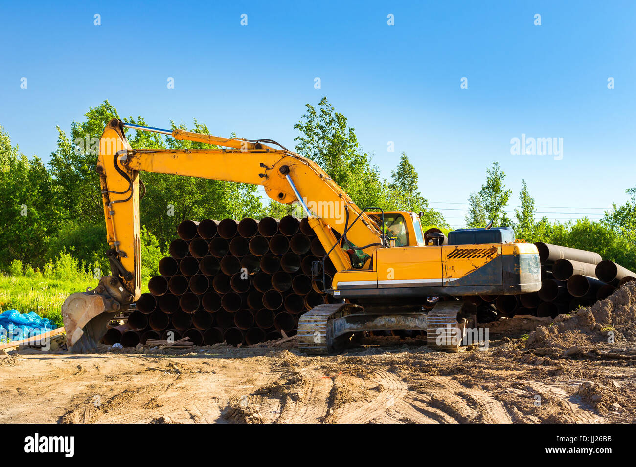 Crawler Excavator digging bucket on construction of high-speed ring ...