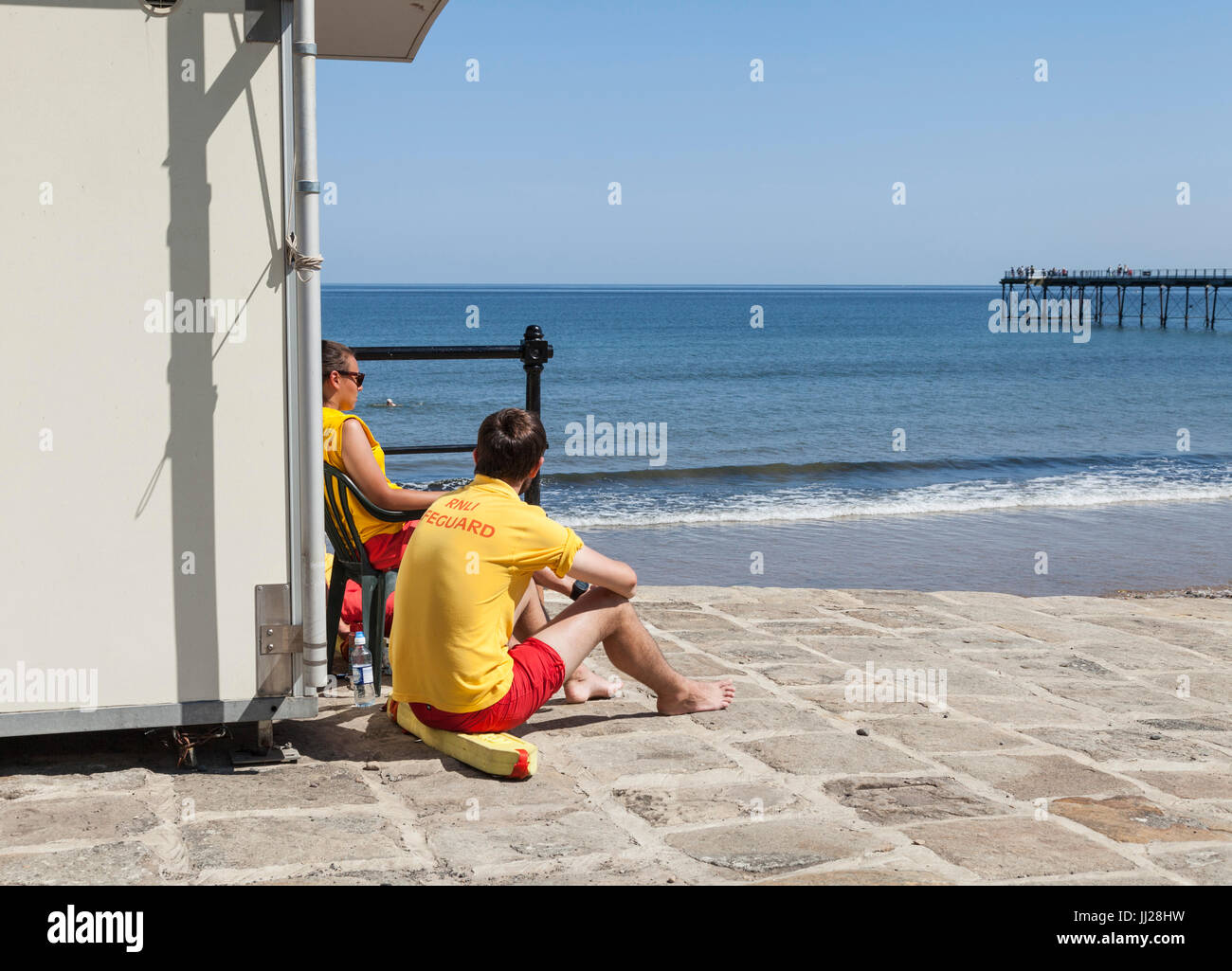 Lifeguard sitting hi-res stock photography and images - Alamy
