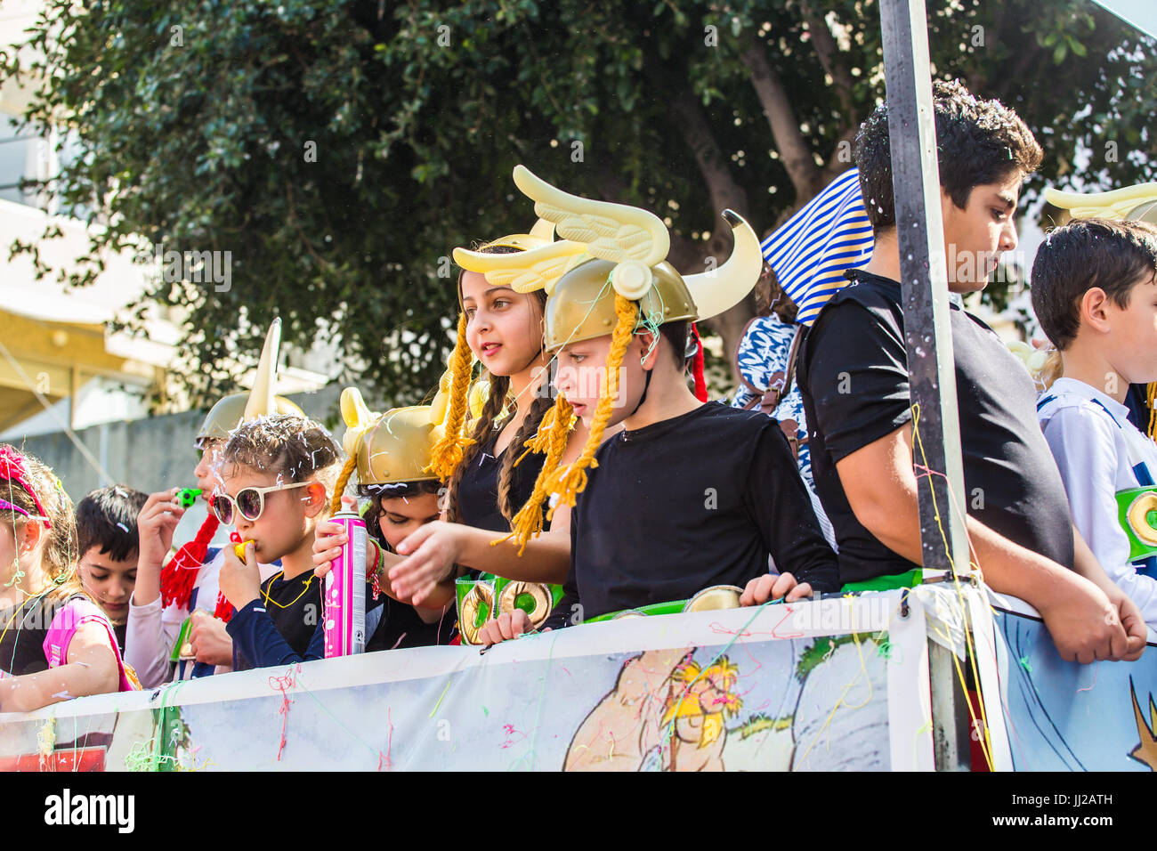 LIMASSOL, CYPRUS - FEBRUARY 26: Happy people in teams dressed with ...