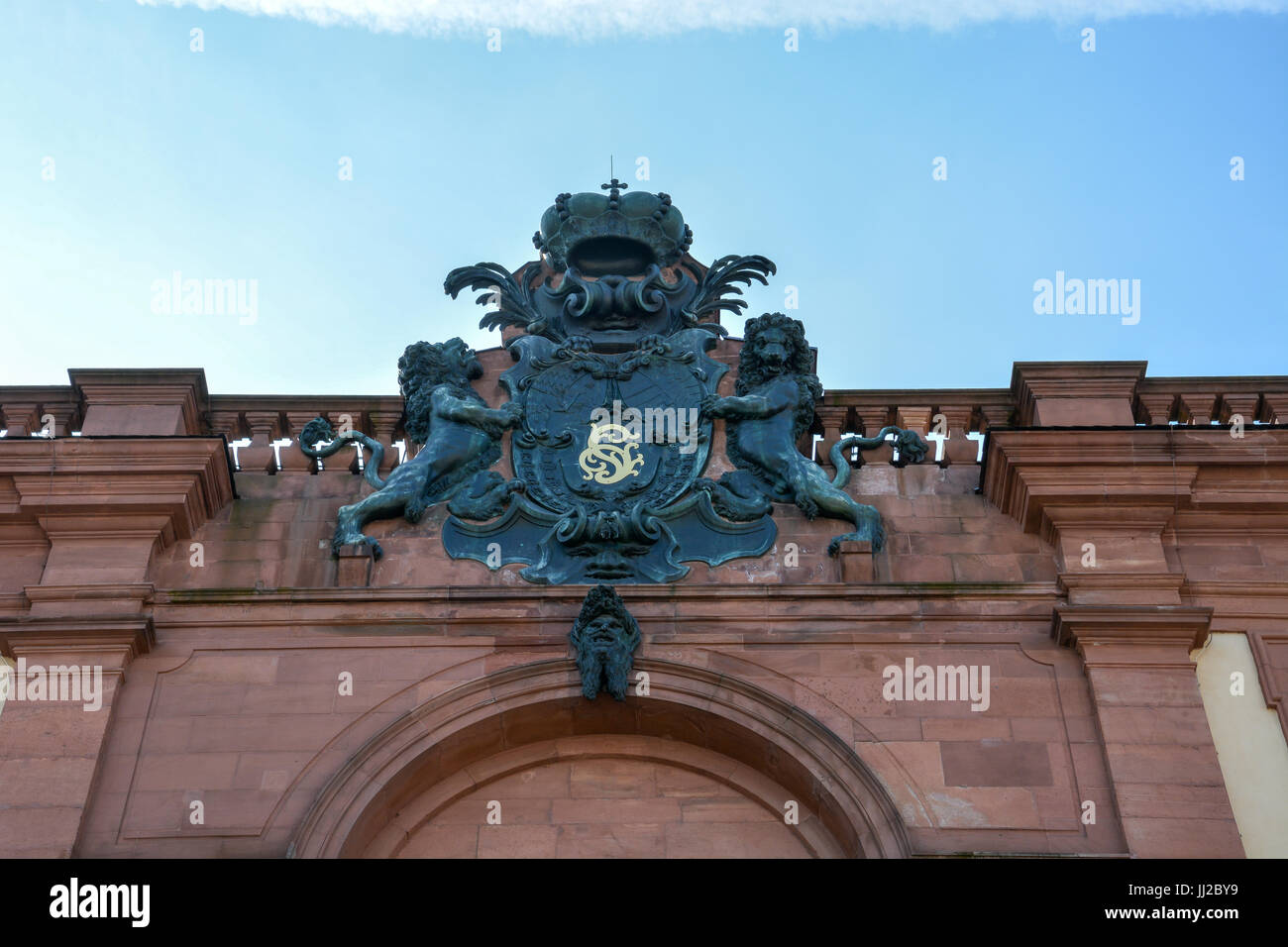 The emblem over the gate of the castle of Mannheim with blue sky Stock ...