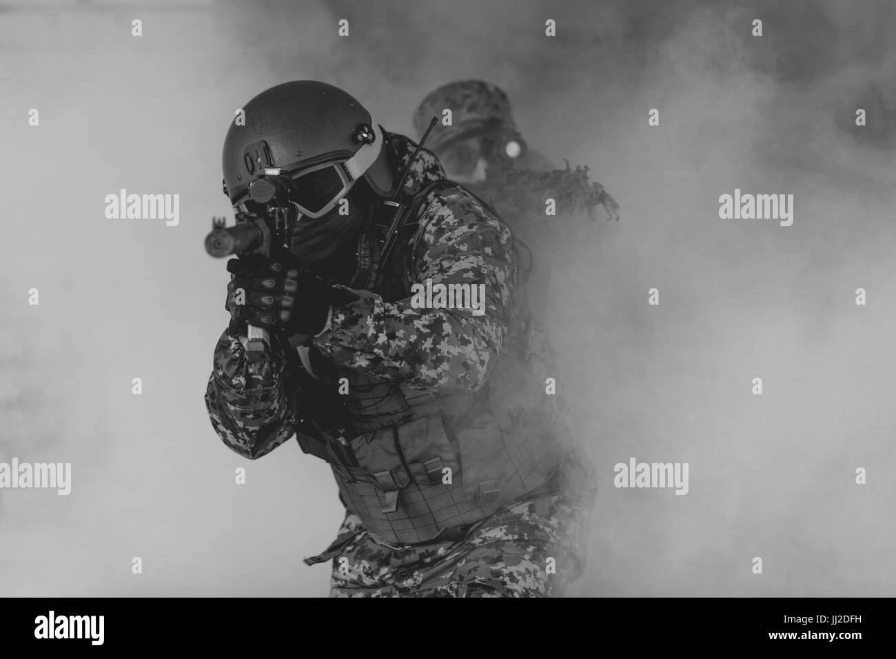 Military men in camouflage , guns Stock Photo - Alamy