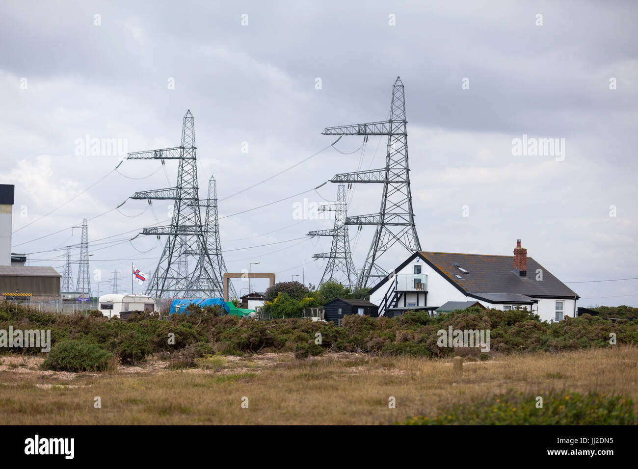 House beside pylon hi-res stock photography and images - Alamy