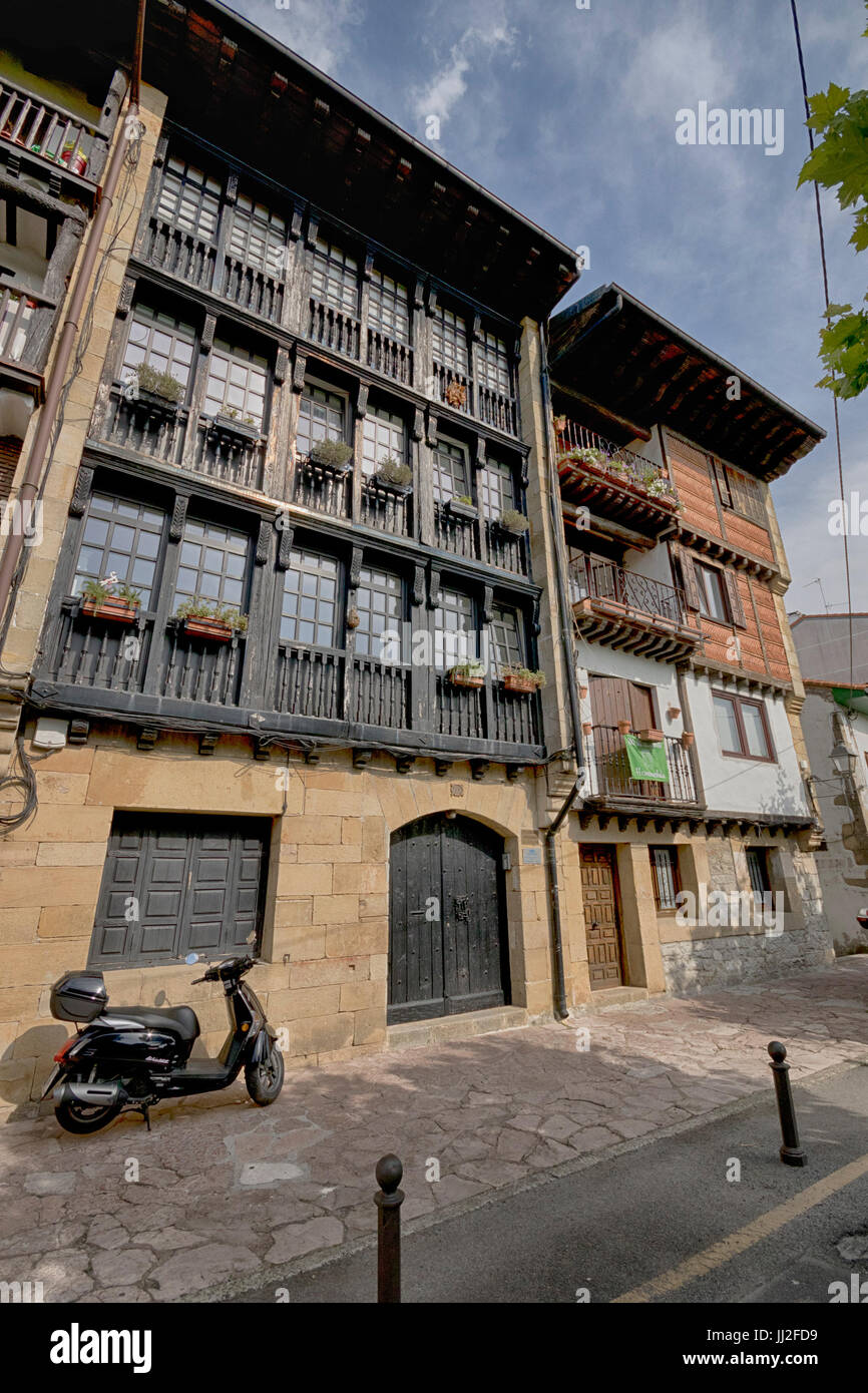 Medieval look houses with small scooter in Hondarribia town (Guipuzcoa ...